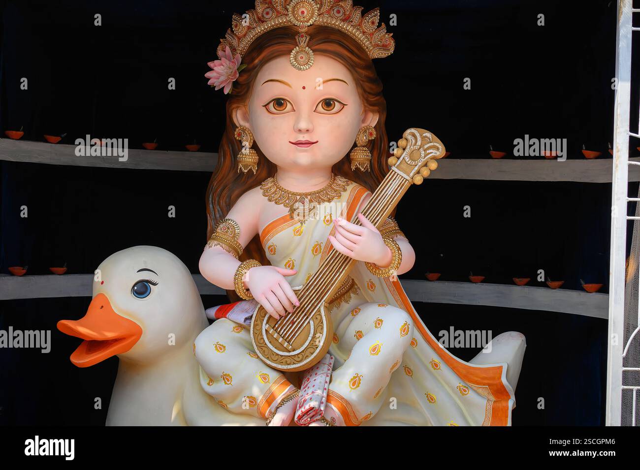 Idol of Goddess Devi Saraswati at a decorated puja pandal in Kolkata ...
