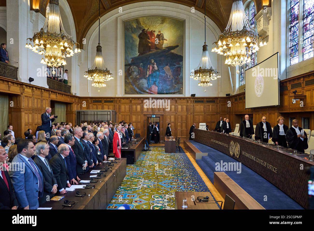 The Judges enter the International Court of Justice, or World Court, in ...