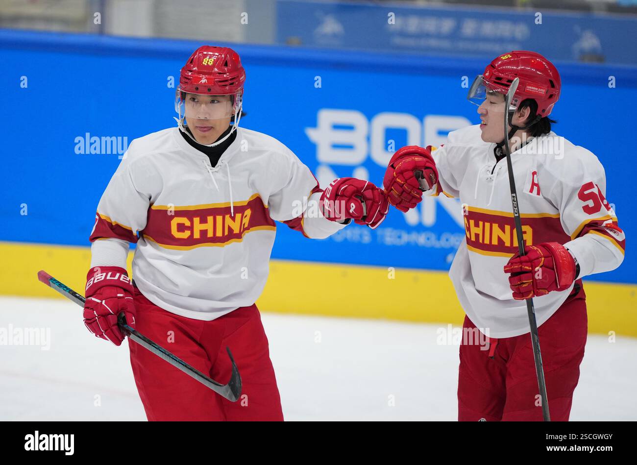 Harbin, China's Heilongjiang Province. 7th Feb, 2025. Yan Juncheng (L ...