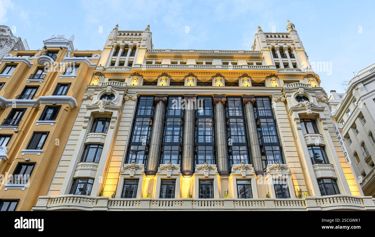 Multi-colored facade of an apartment building in Gran Via Stock Photo ...