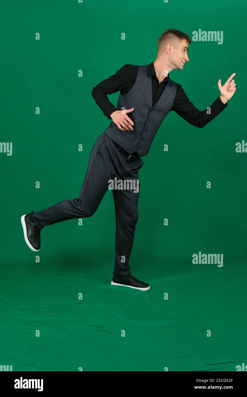 Yes, awesome, cool. Side view of happy smiling overjoyed handsome man ...