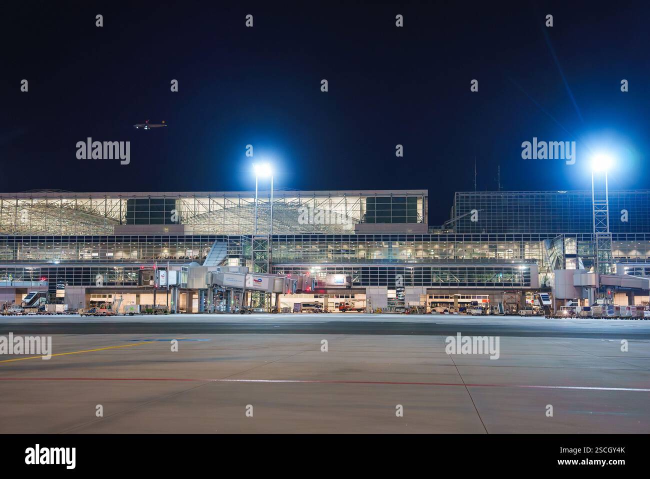 Modern Airport Terminal at Night with Illuminated Glass Facade Stock ...