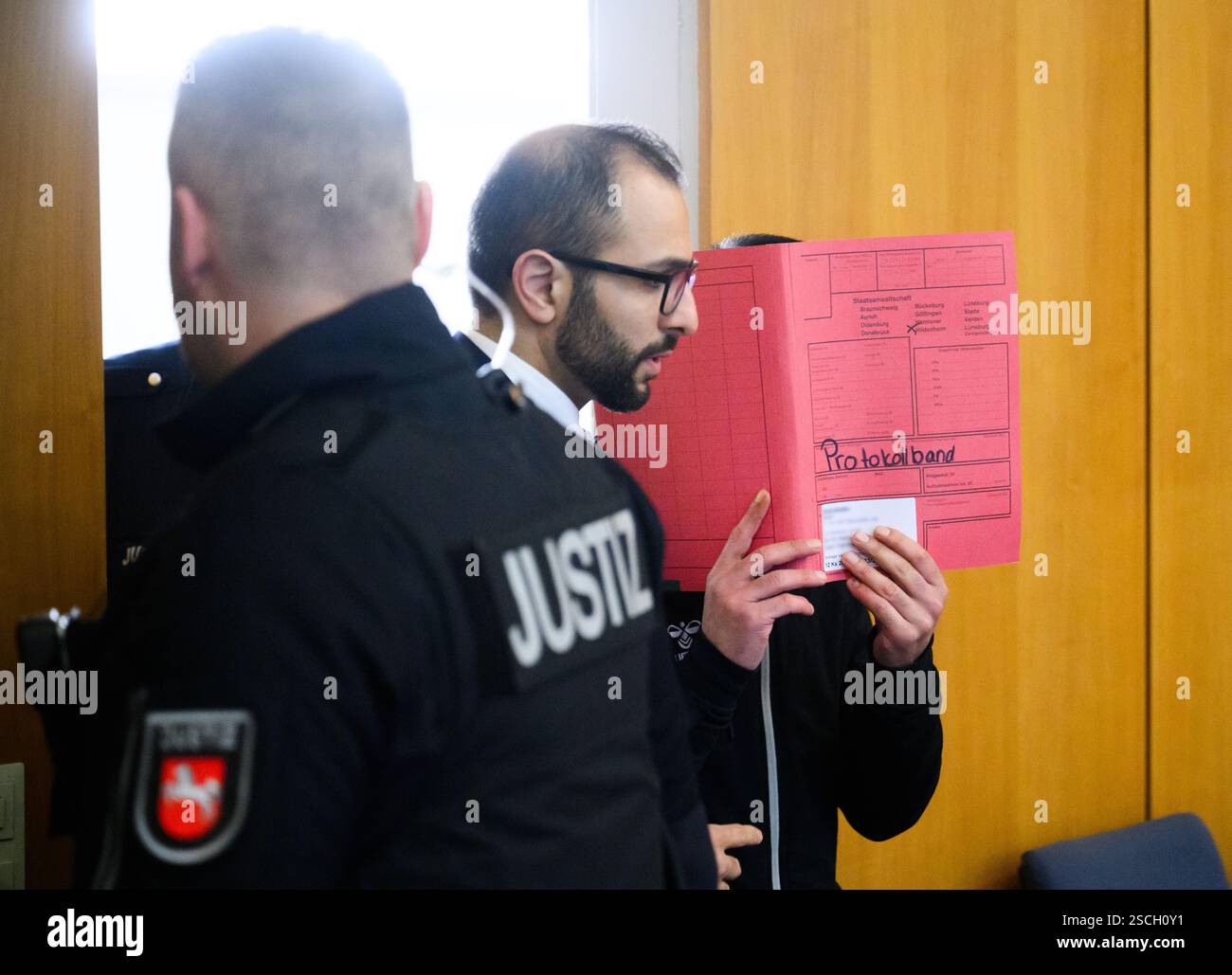 Hildesheim, Germany. 07th Feb, 2025. The defendant (r) enters the ...