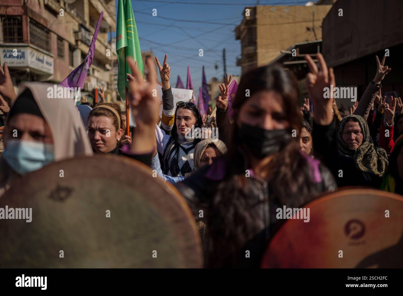 Women attend a rally to mark the 2019 killing of Kurdish politician ...