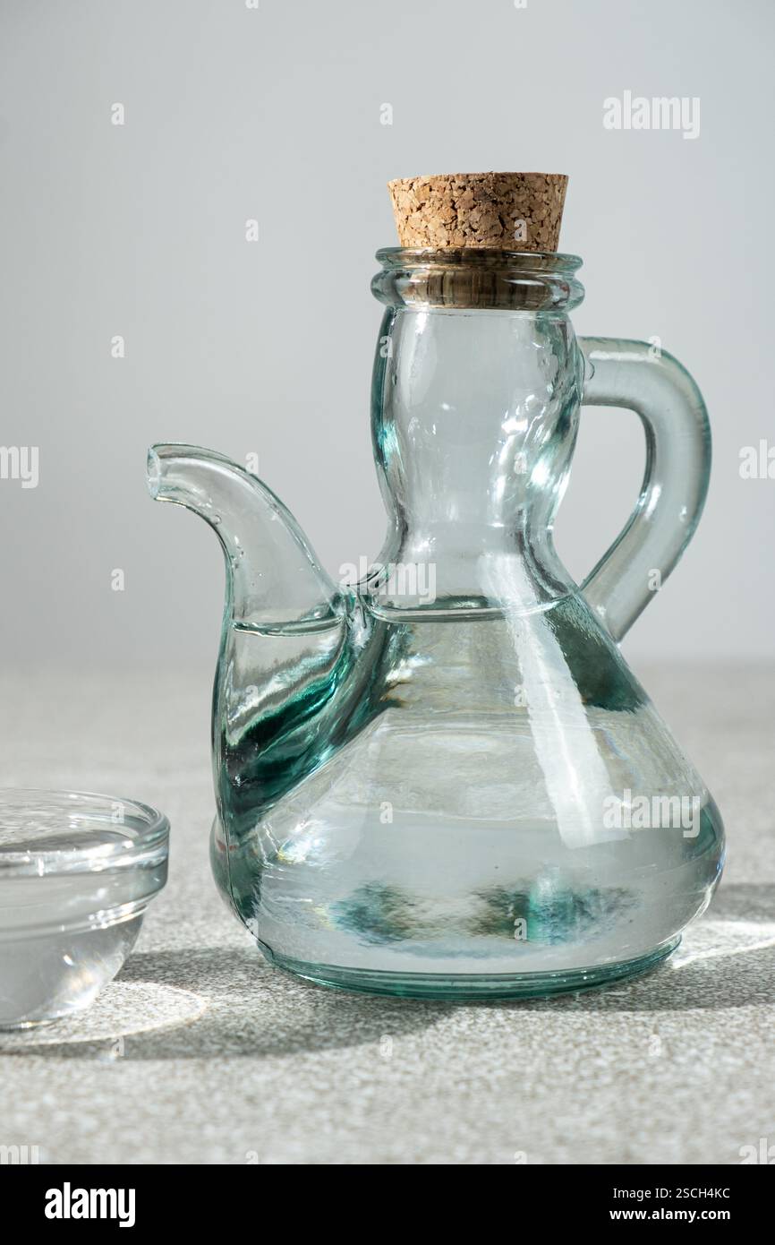 Classic table vinegar in a vinegar container cruet with a cork Stock ...