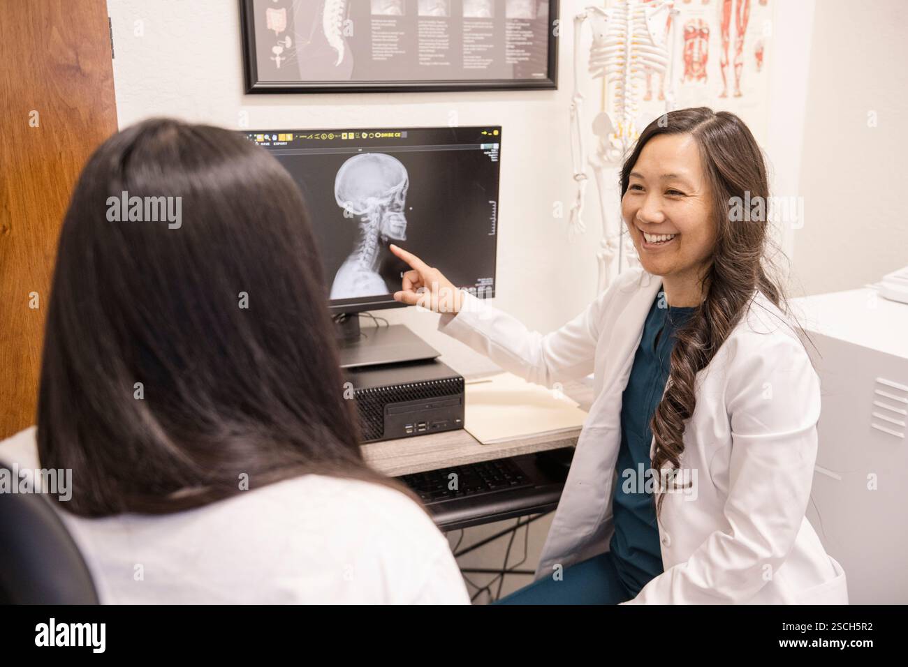 Asian female doctor explaining ray hi-res stock photography and images ...