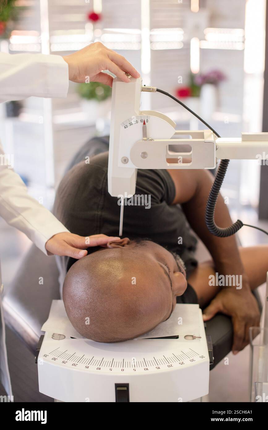 African american male doctor using hi-res stock photography and images ...