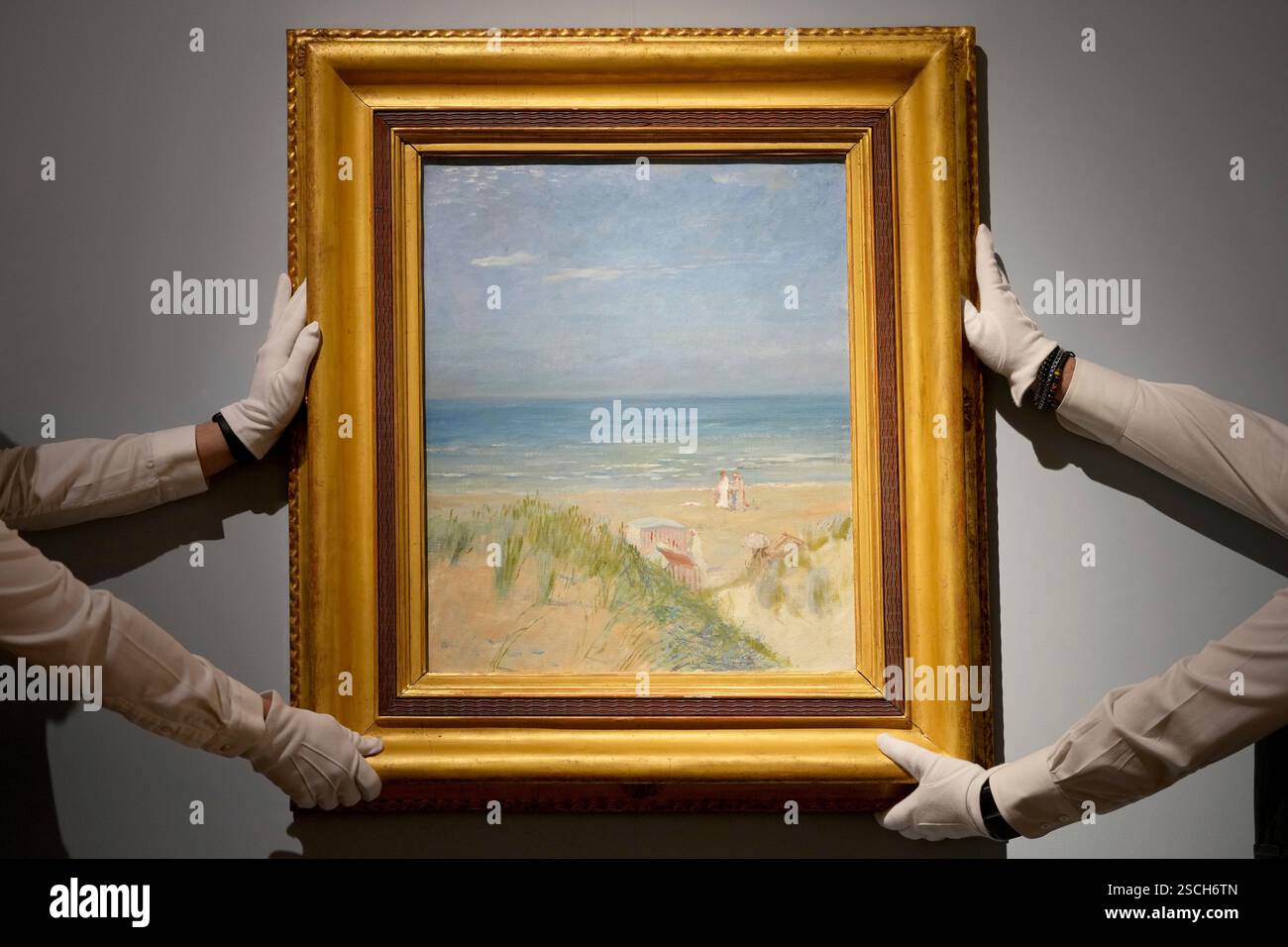 Art handlers display a painting by Charles Conder called Sand dunes, Ambleteuse ahead of the ...