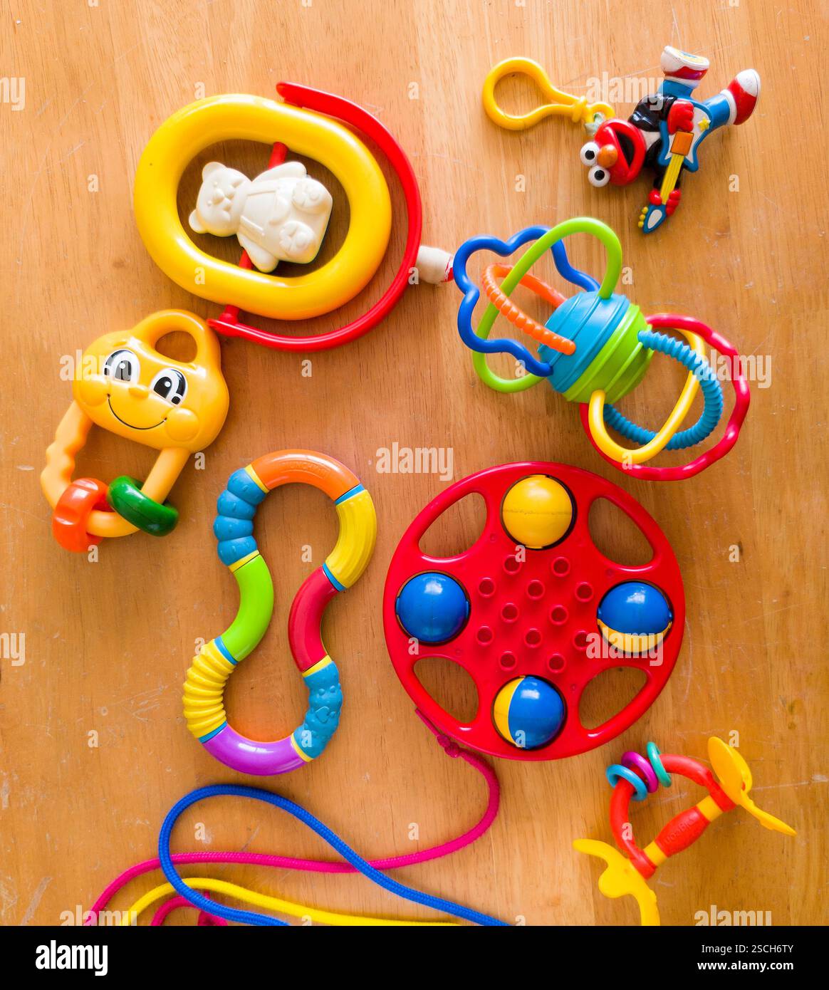 Colourful young child's toys, brightly coloured Stock Photo - Alamy