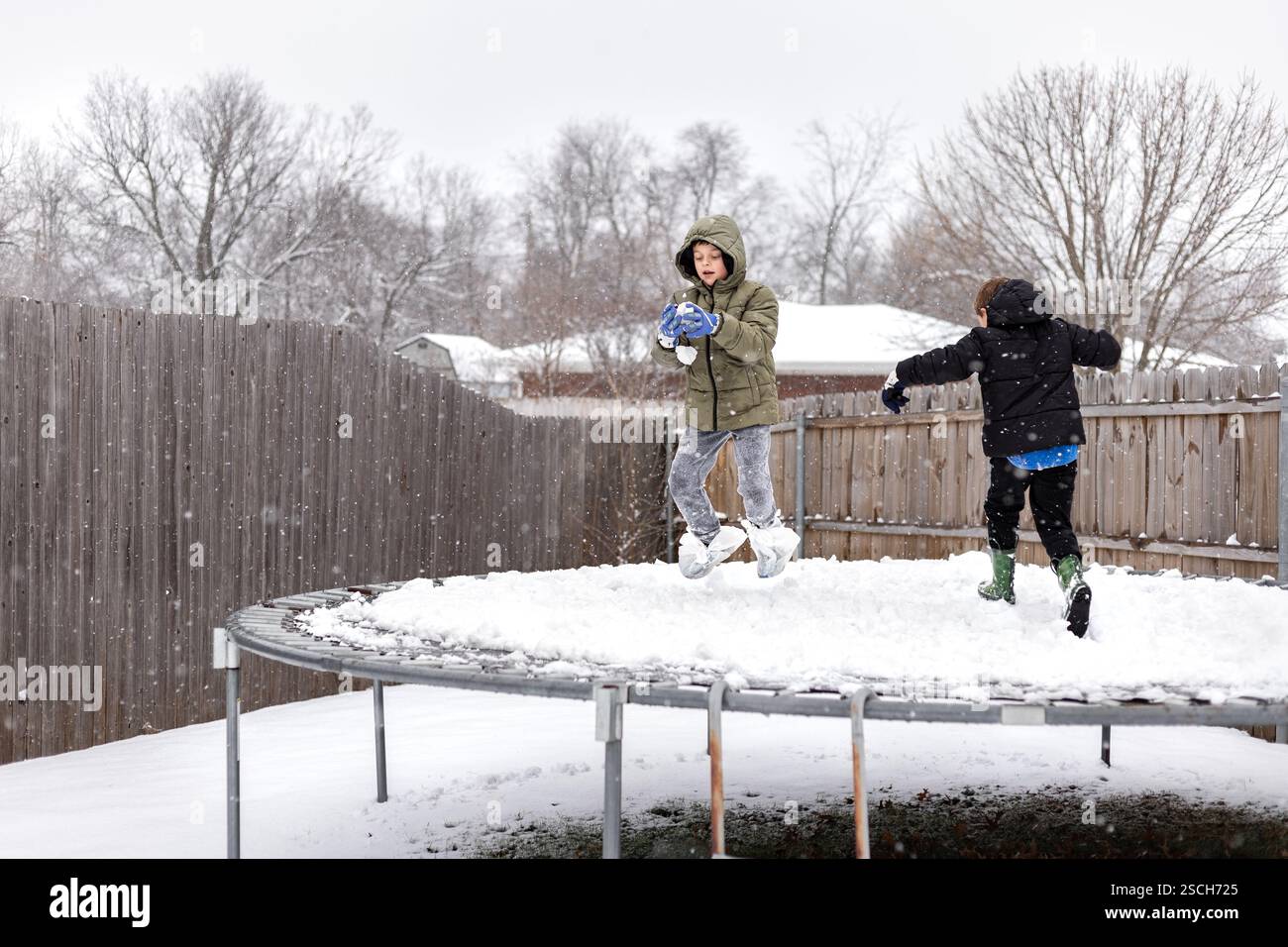 Two boys on trampoline hi-res stock photography and images - Alamy