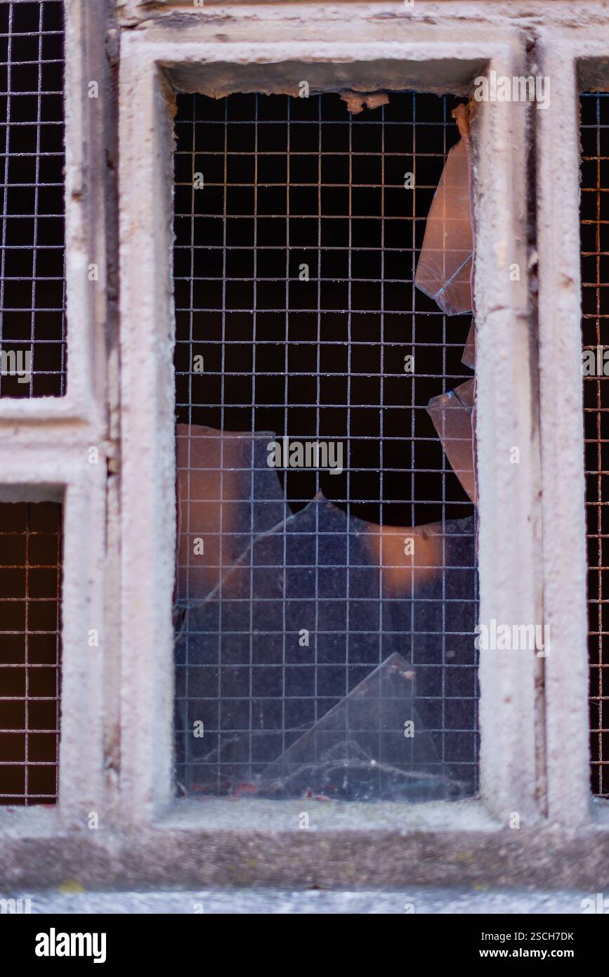 window of abandoned building with broken glass Stock Photo - Alamy