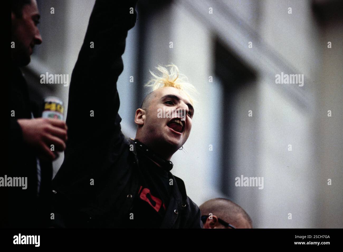 Young punk male shouting during anti war protest Stock Photo - Alamy