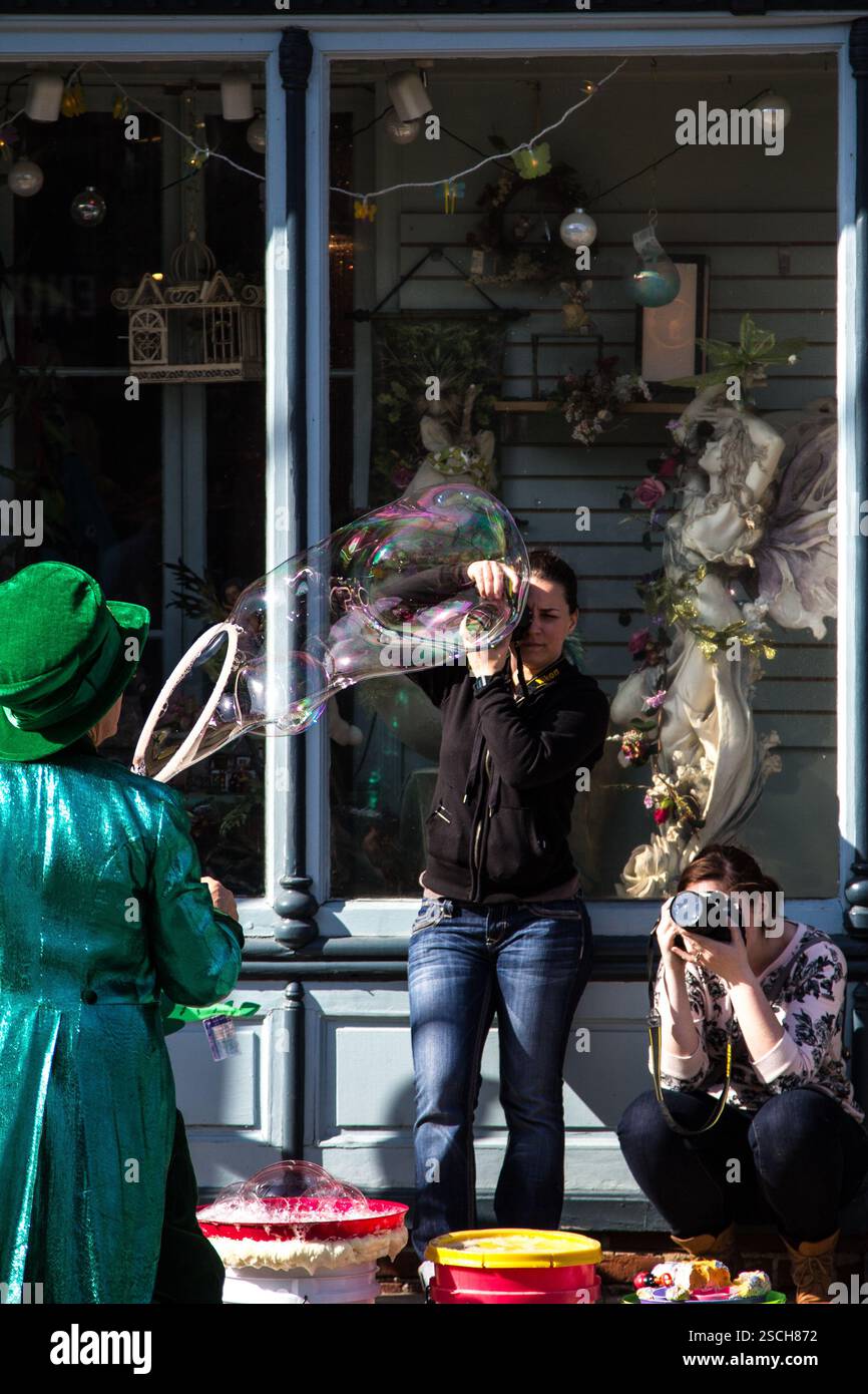 Bubble artist creates giant bubbles; photographer captures the action ...
