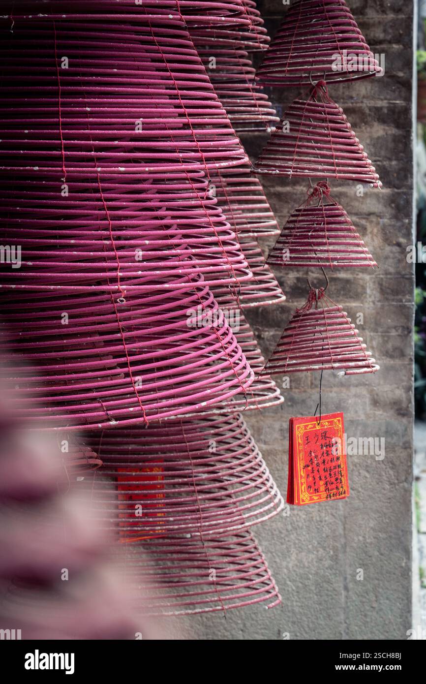 Red incense coils, hanging from ceiling at chinese temple Stock Photo ...