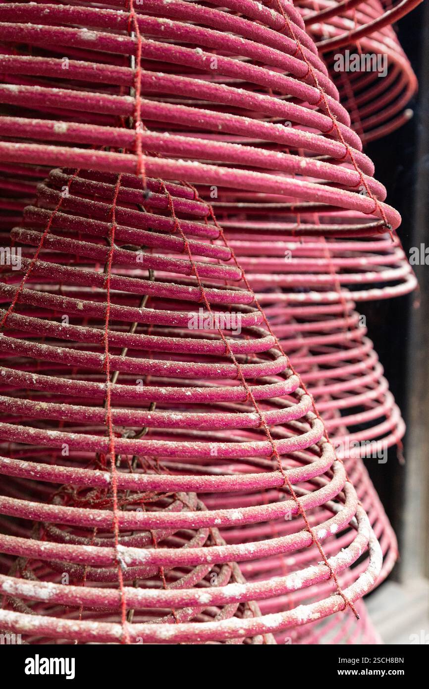 Red incense coils, hanging from ceiling at chinese temple Stock Photo ...