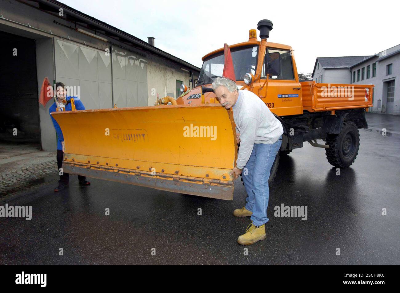 country road, snow clearing vehicle in winter service snow clearing ...