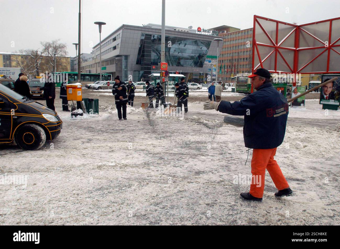 pavement gritting in the winter, seasonal road maintenance work ...
