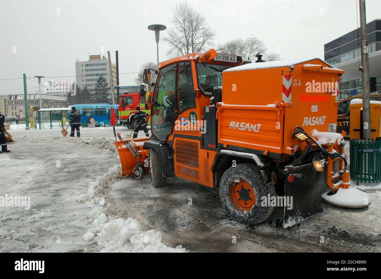 country road, snow clearing vehicle in winter service snow clearing ...