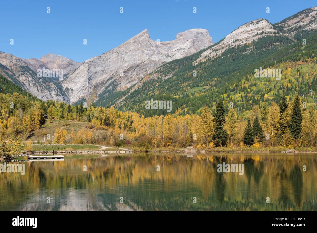View of Three Sisters mountain from Maiden Lake in Fernie, BC Stock ...