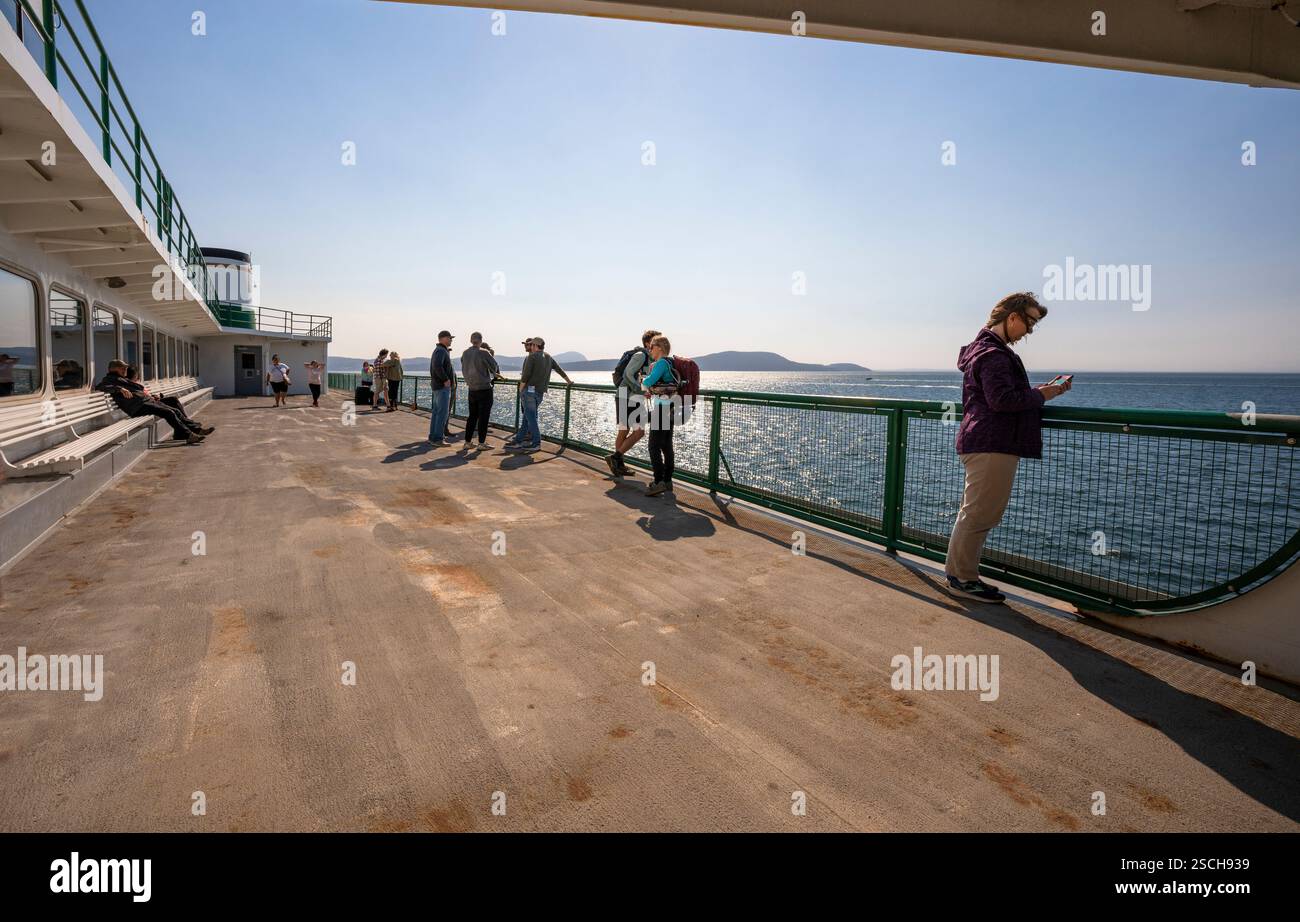 People look out during ferry ride from Anacortes, Washington Stock ...
