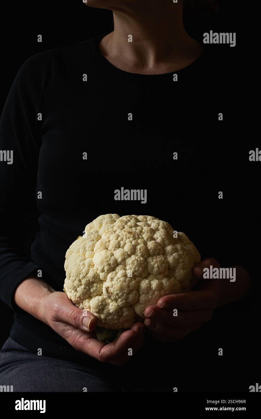 Female hands holding cauliflower hi-res stock photography and images ...