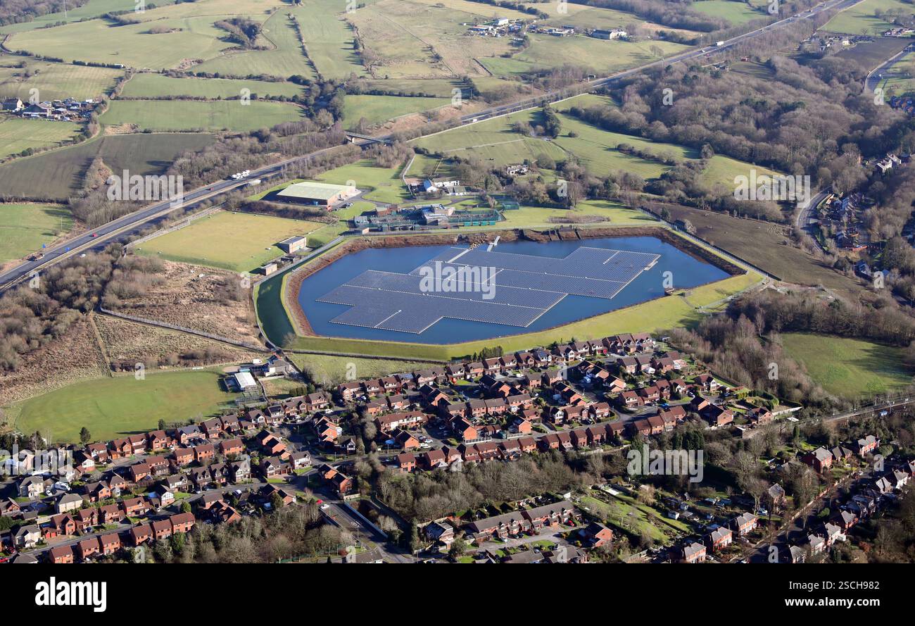 Aerial view of Godley Reservoir in Hyde, Cheshire with a floating solar ...