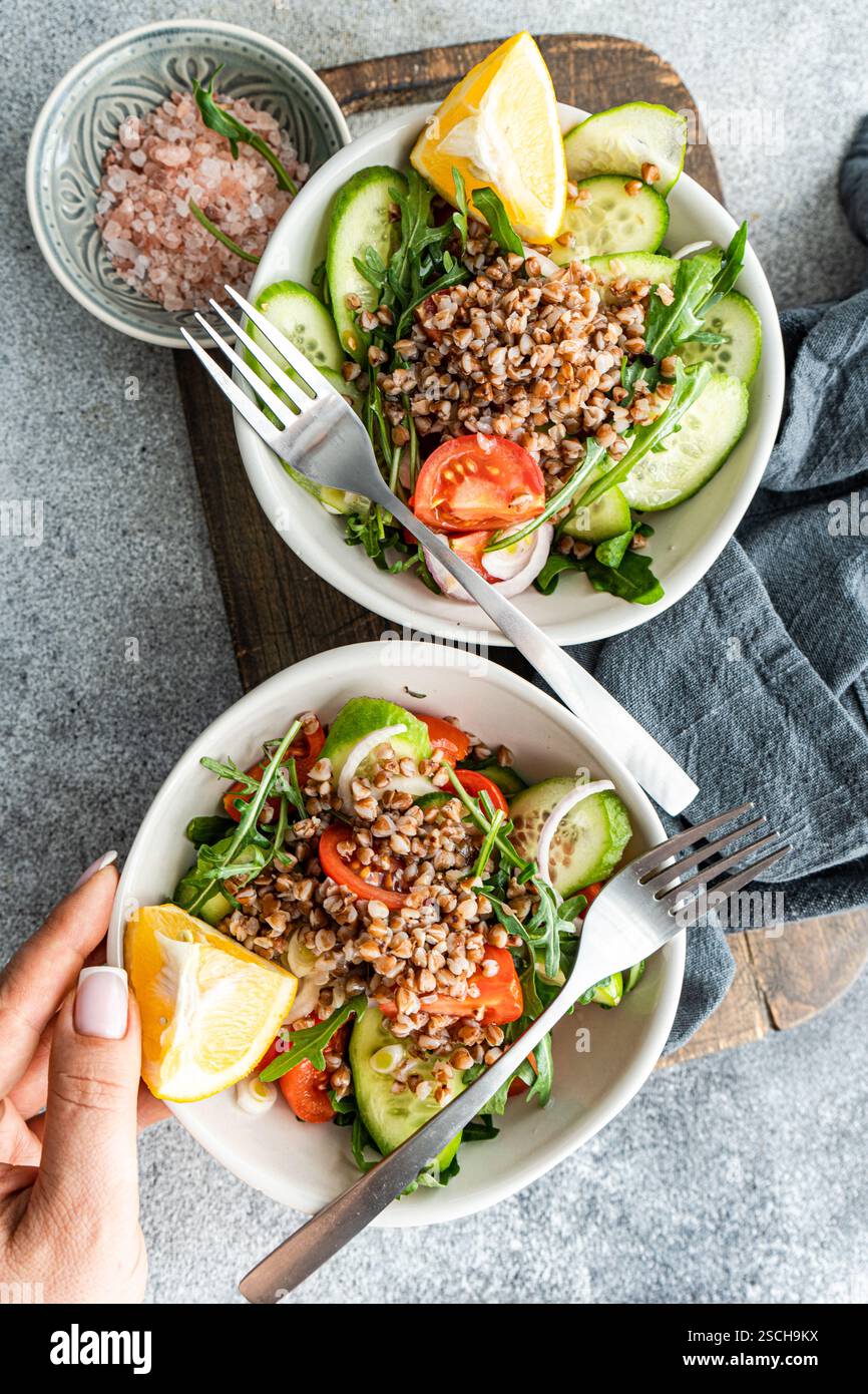 A vibrant, healthy lunch featuring fresh rocket, oregano, cherry ...