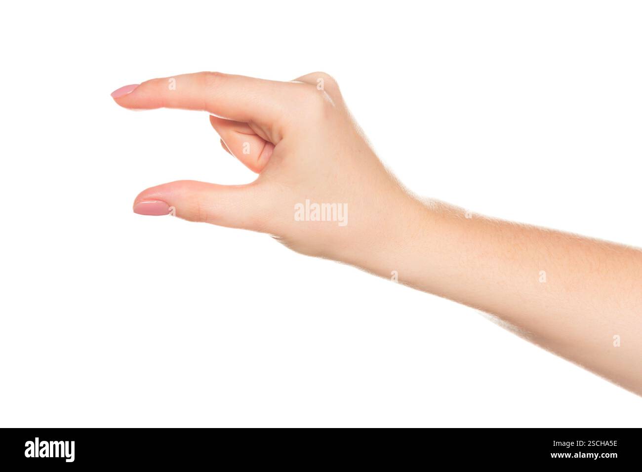 Hand gesture shows a small object being held with fingers in bright ...