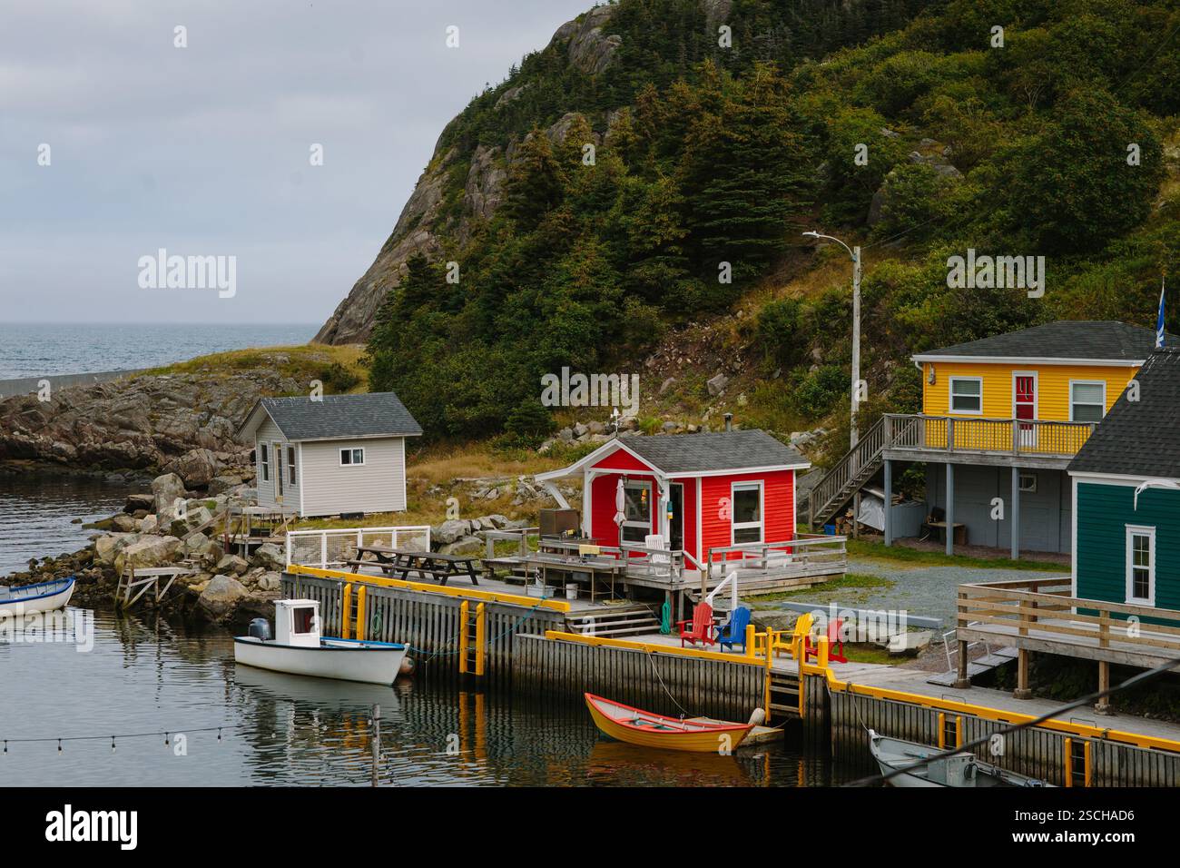 Quaint and colorful fishing huts line the shores of St. John's ...