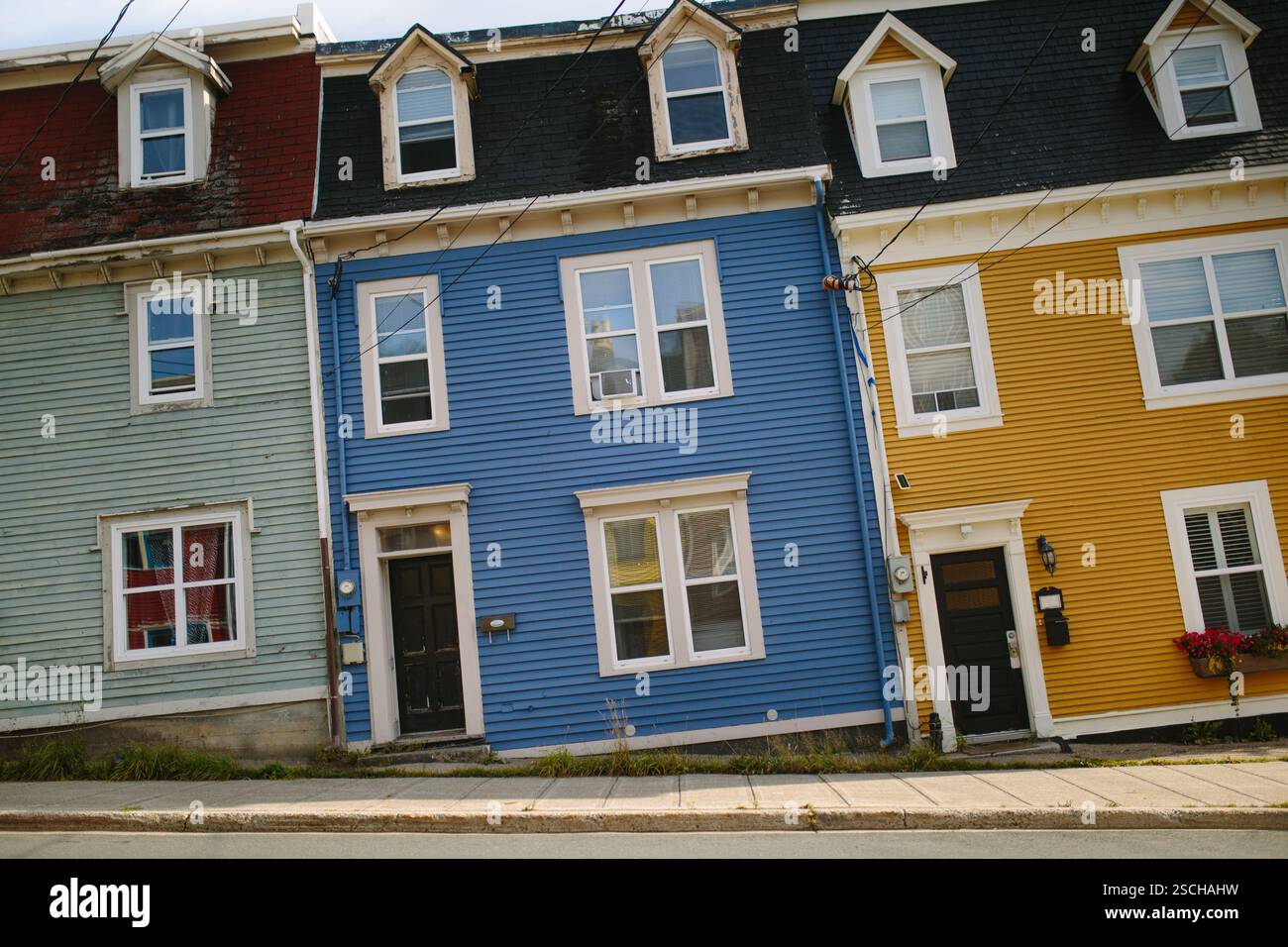 Vibrant row of traditional houses, showcasing the iconic architecture ...