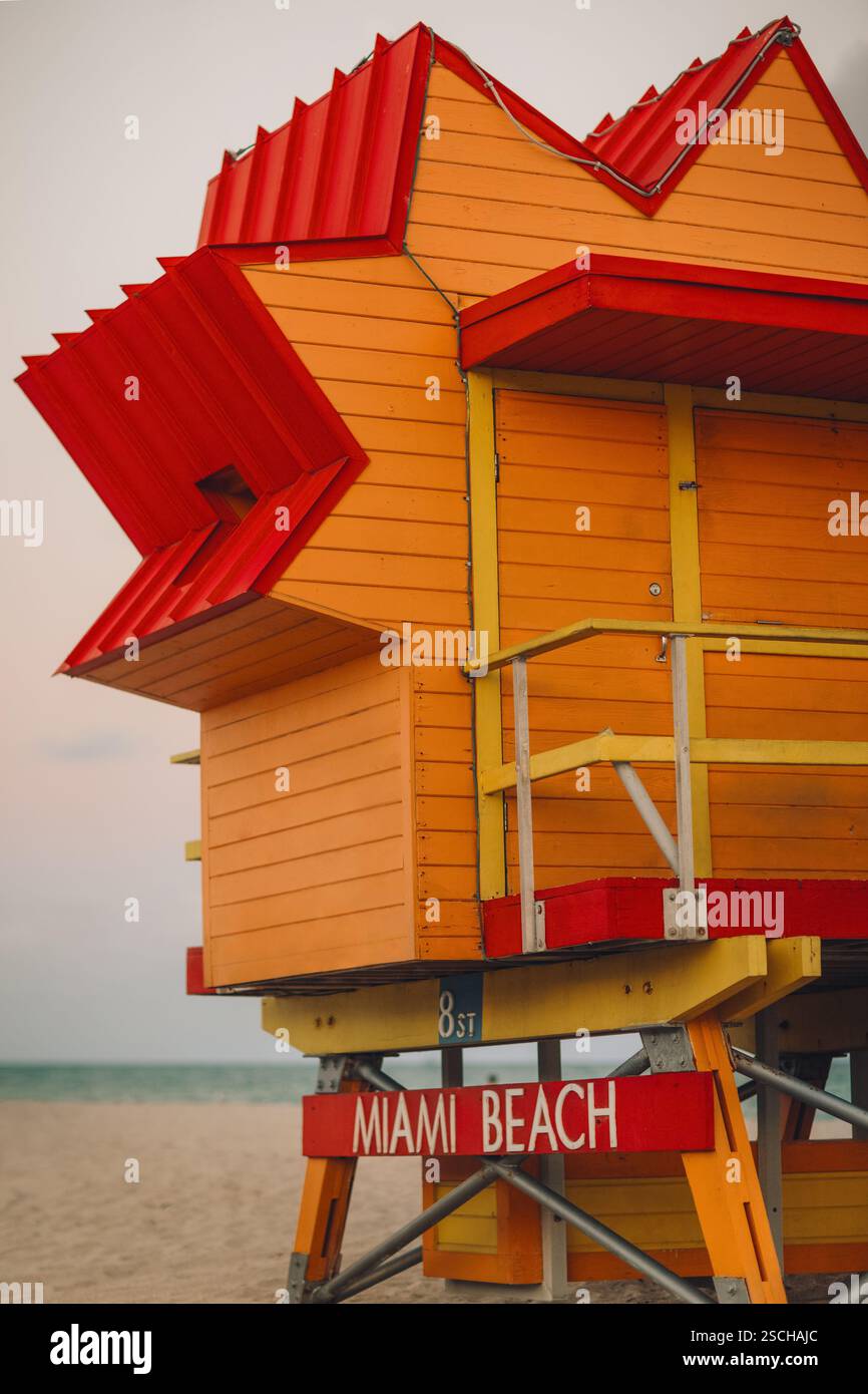 A vibrant, colorful lifeguard stand at Miami Beach, featuring a bold ...
