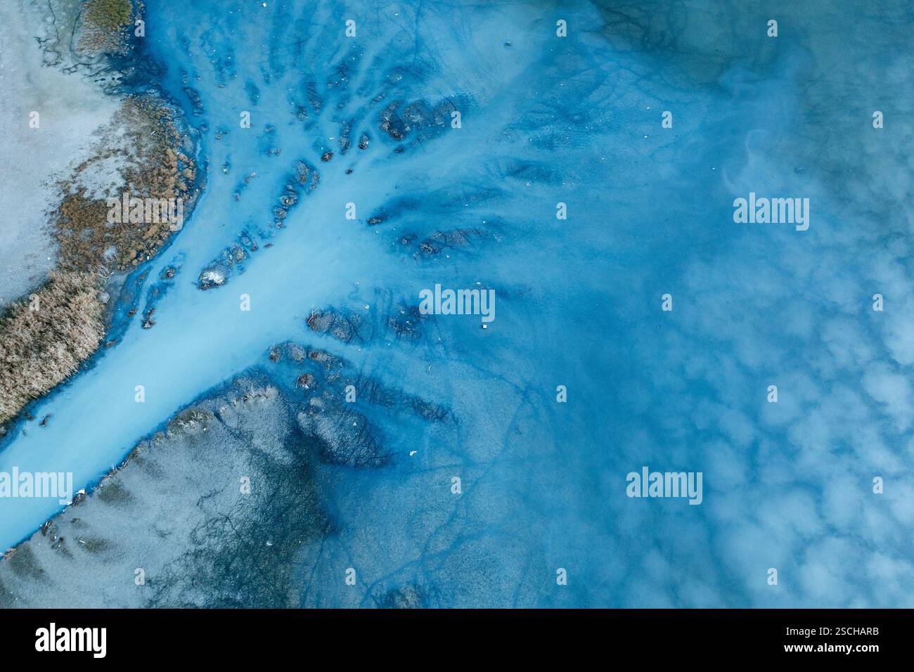 Aerial photograph of Toledo Lagoons in Spain, capturing intricate water ...