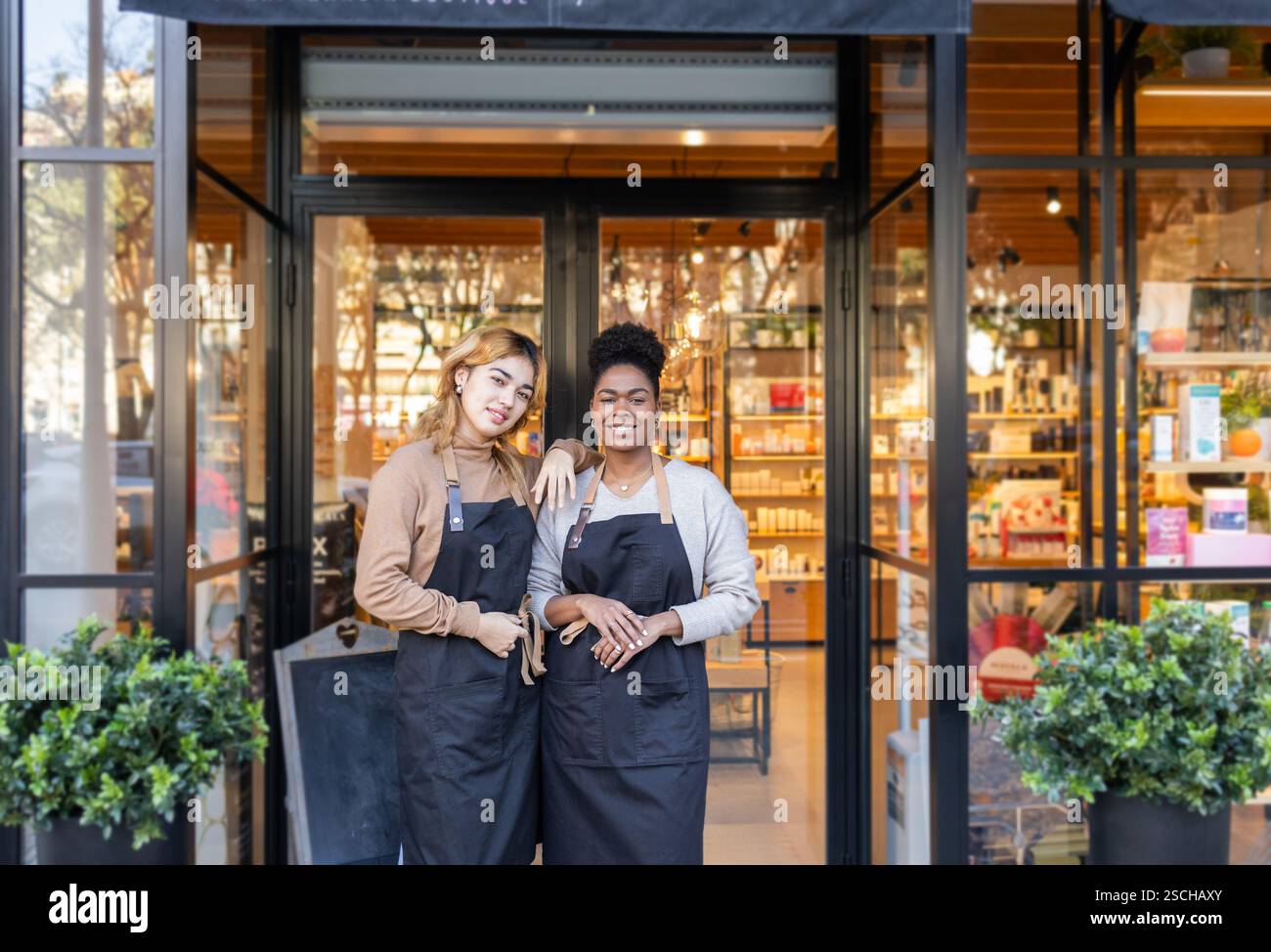 Two employees stand hi-res stock photography and images - Alamy
