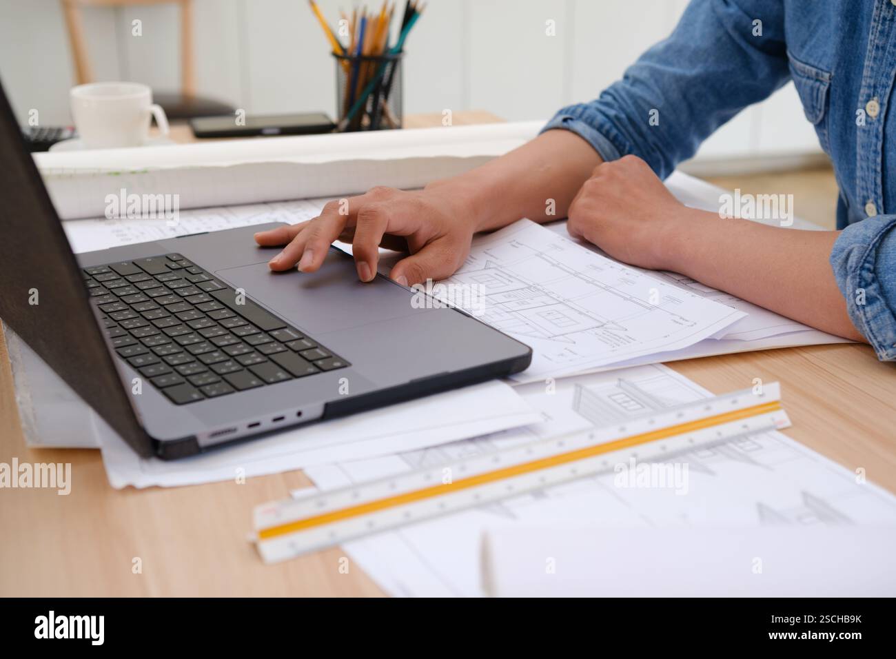 Male architect house plans hi-res stock photography and images - Alamy