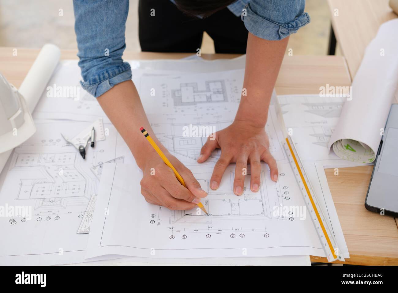 Architect blueprint compass on desk hi-res stock photography and images ...