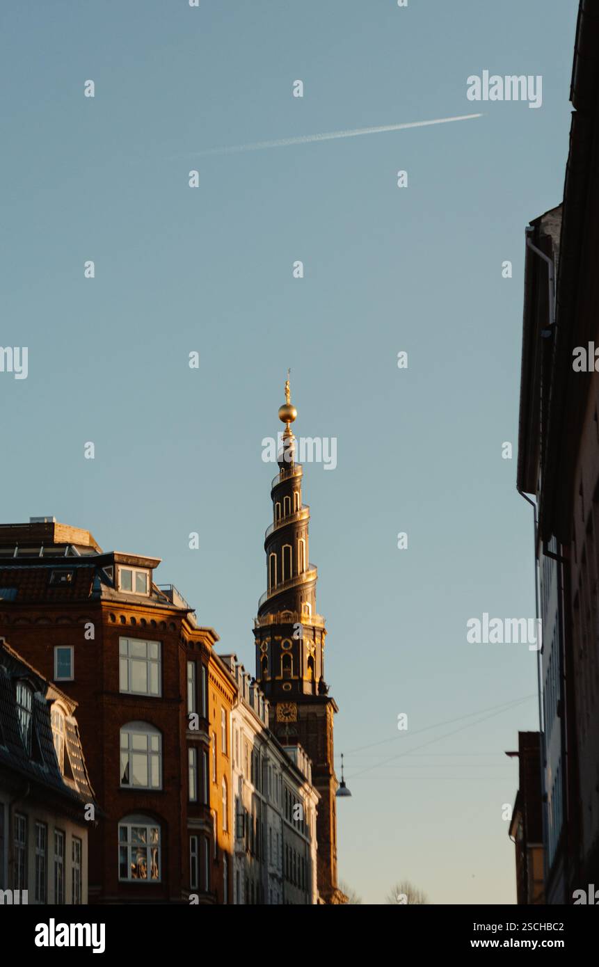 golden architectural spire building in historic city Stock Photo - Alamy