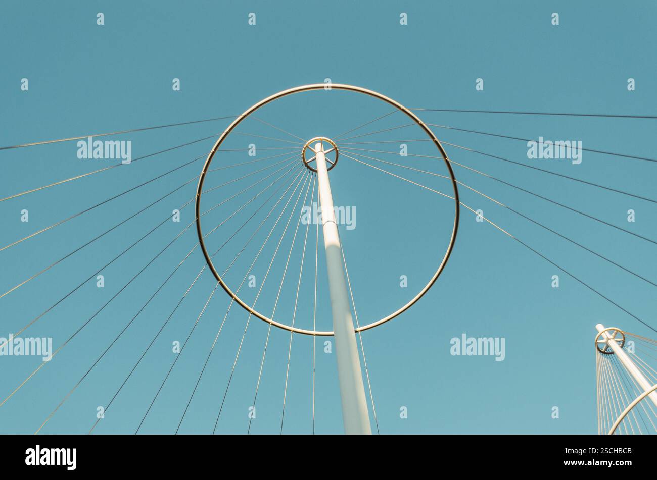 modern circular cable design against blue sky Stock Photo - Alamy