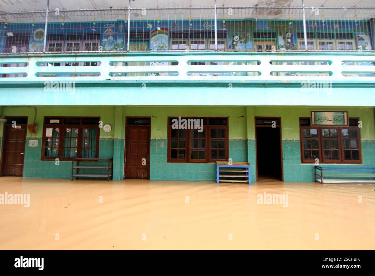 Kudus, Indonesia. 7th Feb, 2025. A flooded building is seen after heavy ...