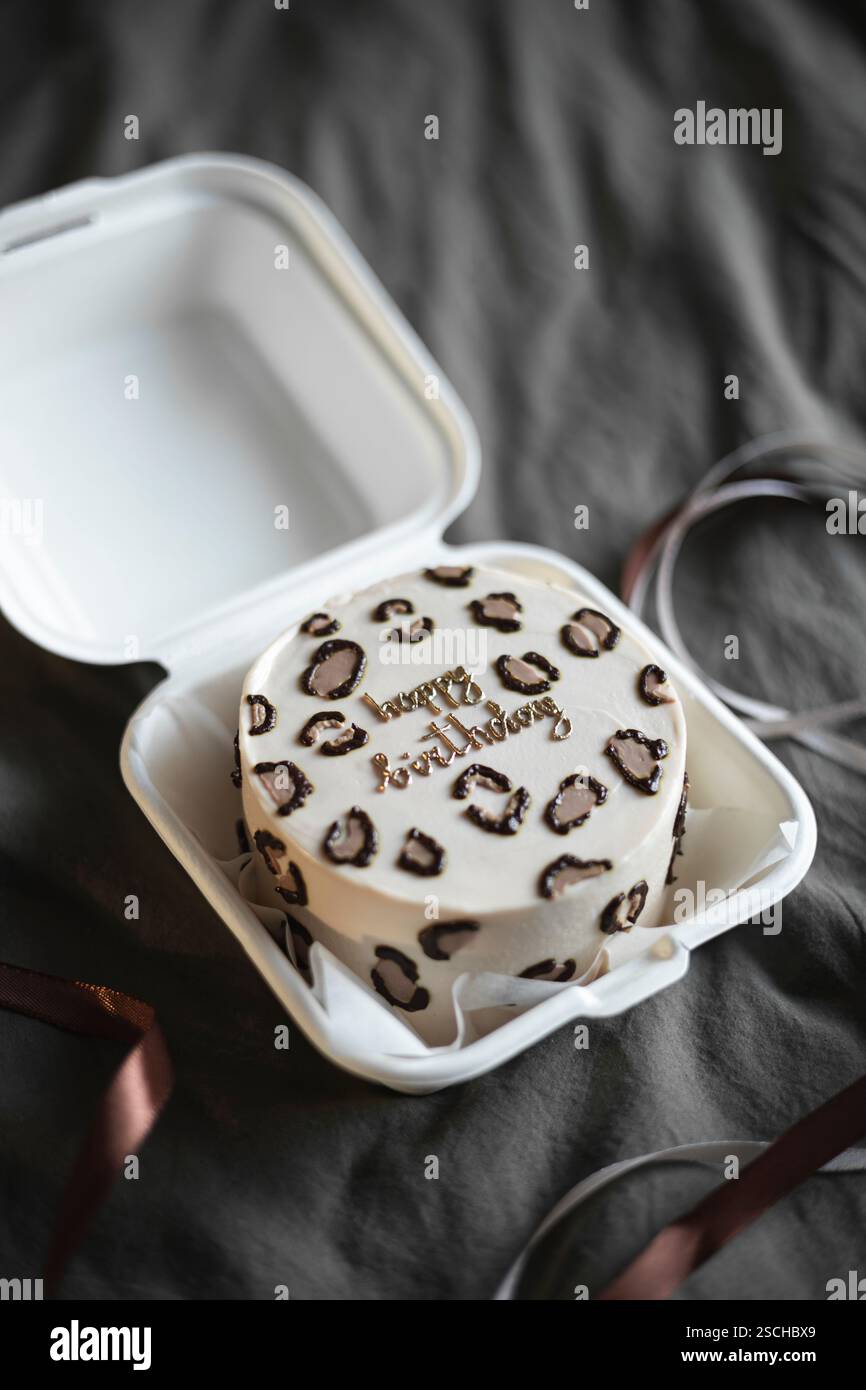 Stylish bento birthday cake with leopard print and golden lettering ...
