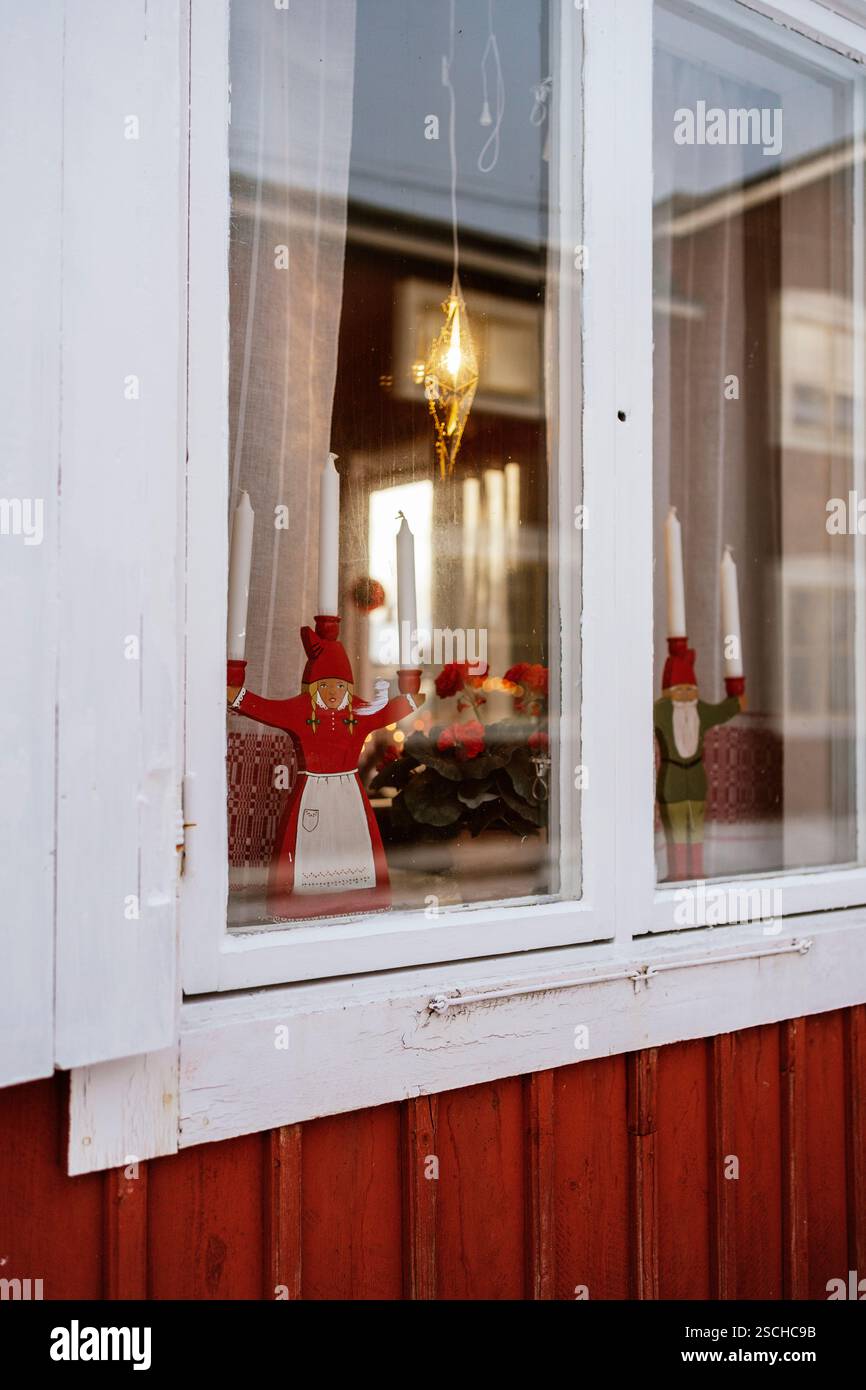 A cozy Lapland window adorned with traditional Swedish Christmas ...