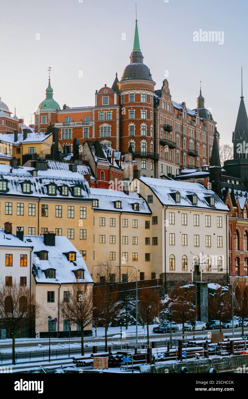 Experience the charm of Stockholm with this image of snow-adorned ...