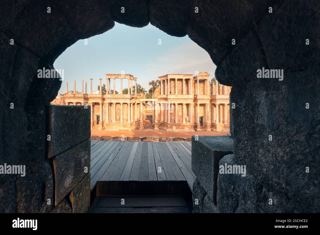 The majestic ancient Roman theatre of Merida, Spain, through a stone ...
