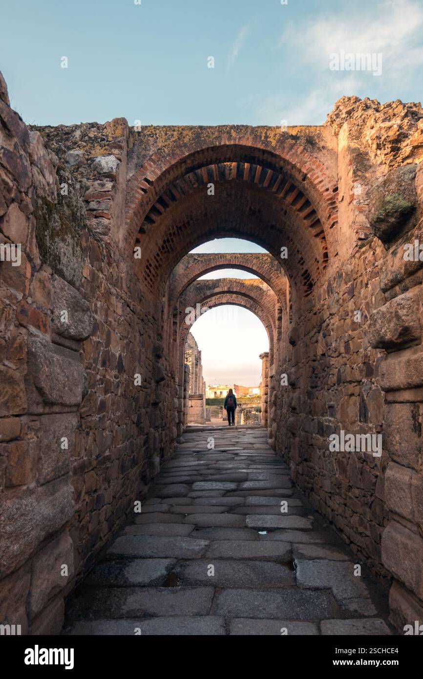 A captivating view through the ancient Roman theatre arches in Merida ...
