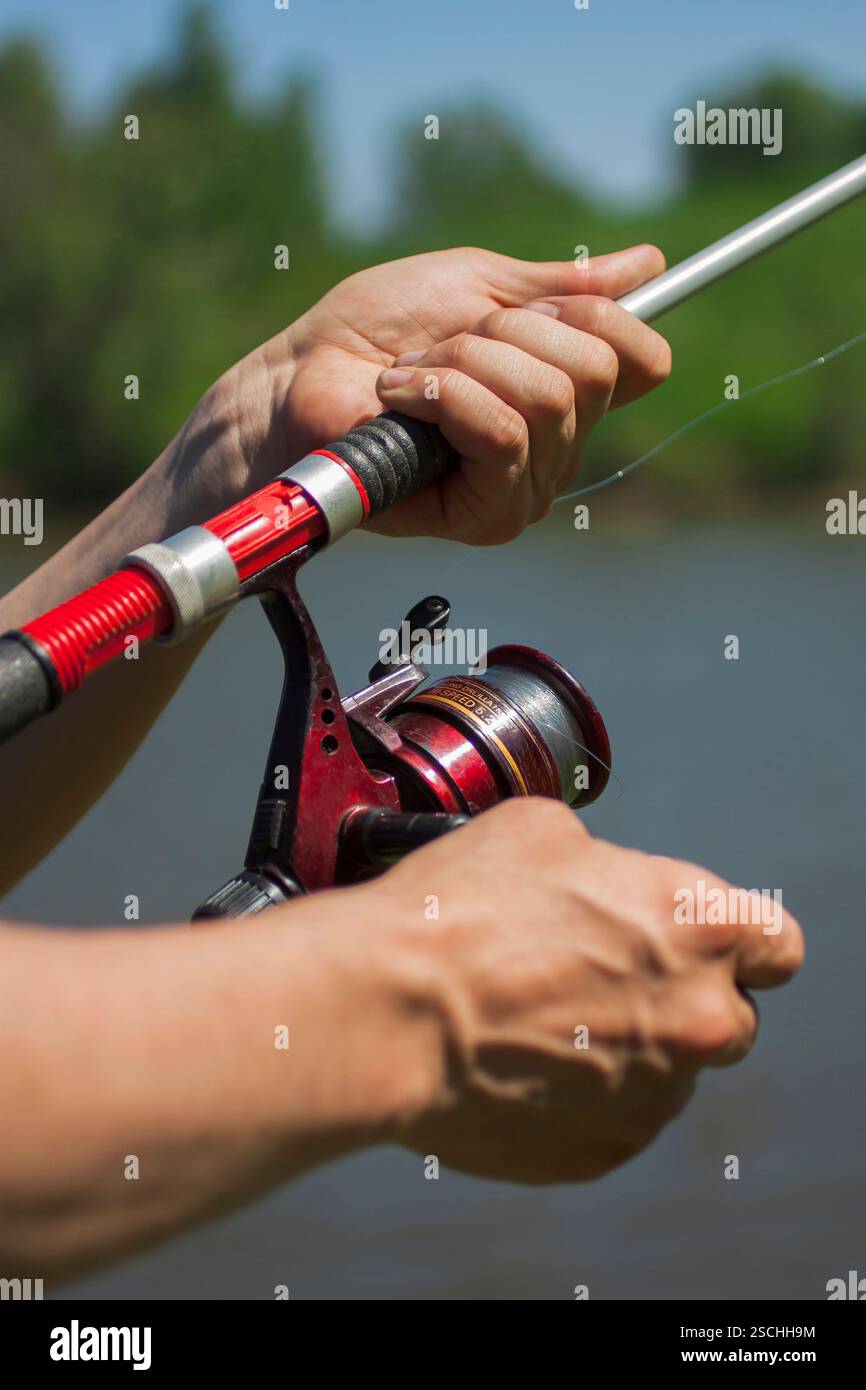 Fisher fishing on pond coast hi-res stock photography and images - Alamy