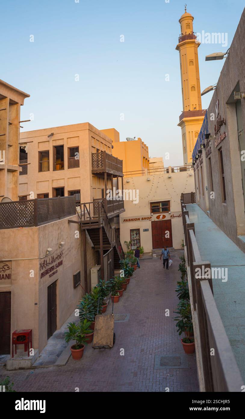 DUBAI, UAE - 8 NOVEMBER 2013: Old buildings and narrow streets in Deira ...