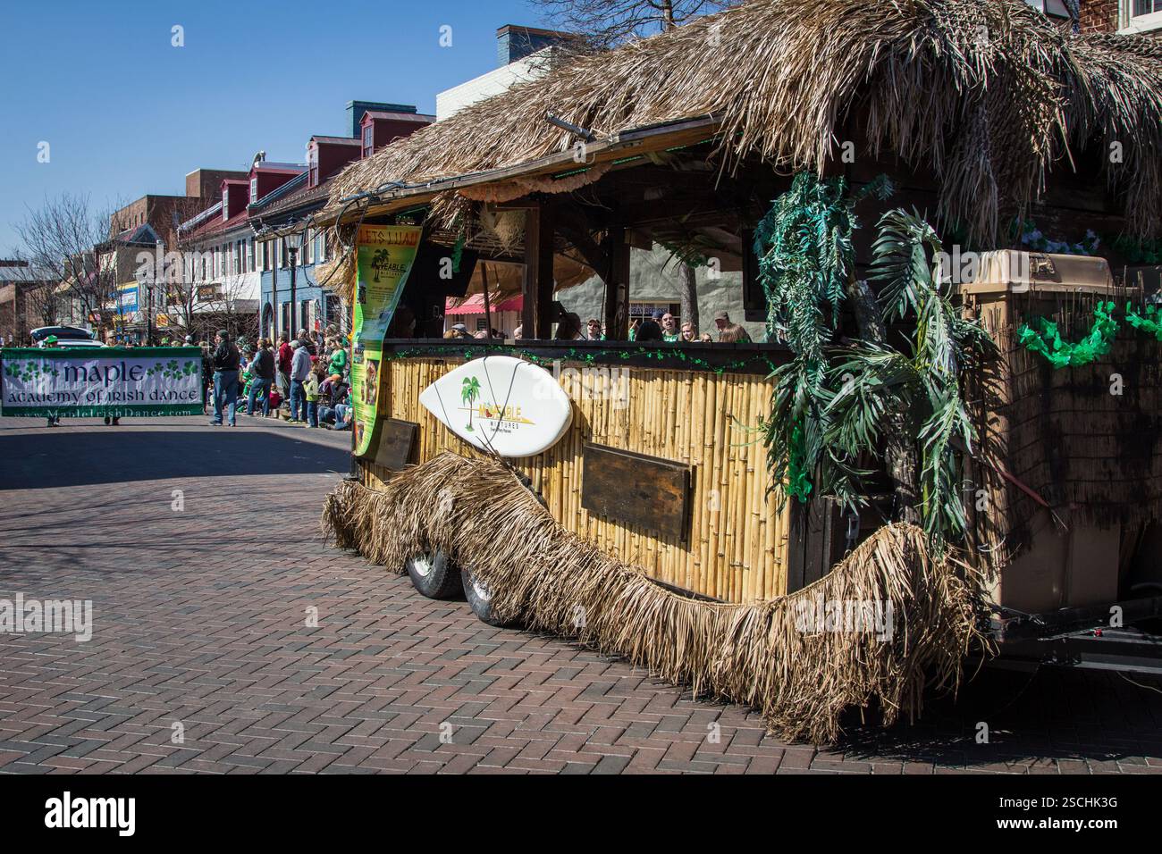 Maple Academy of Irish Dance float in parade, themed as a luau. People ...