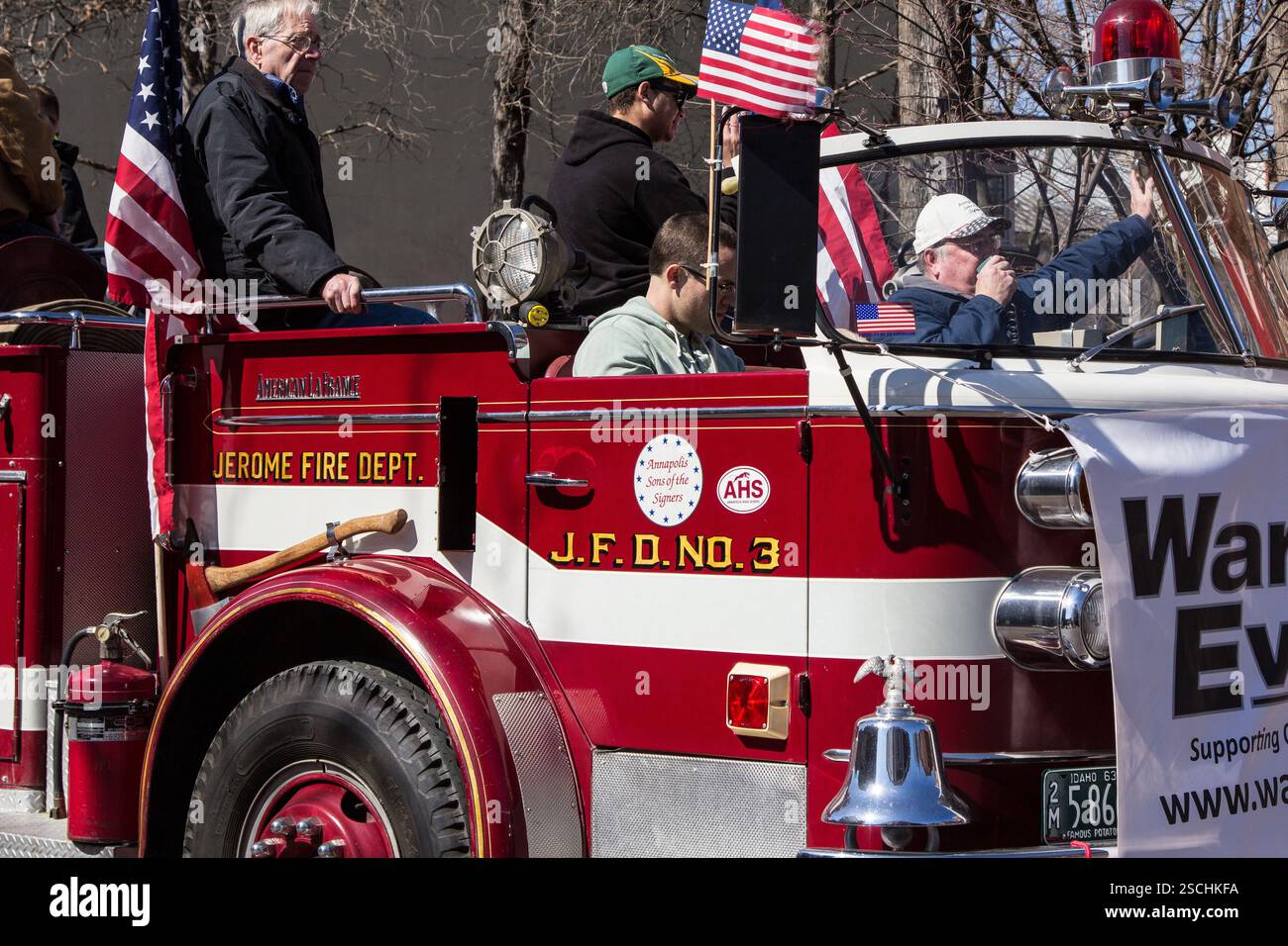 Jerome Fire Dept. (J.F.D. No. 3) members, likely in parade, with ...