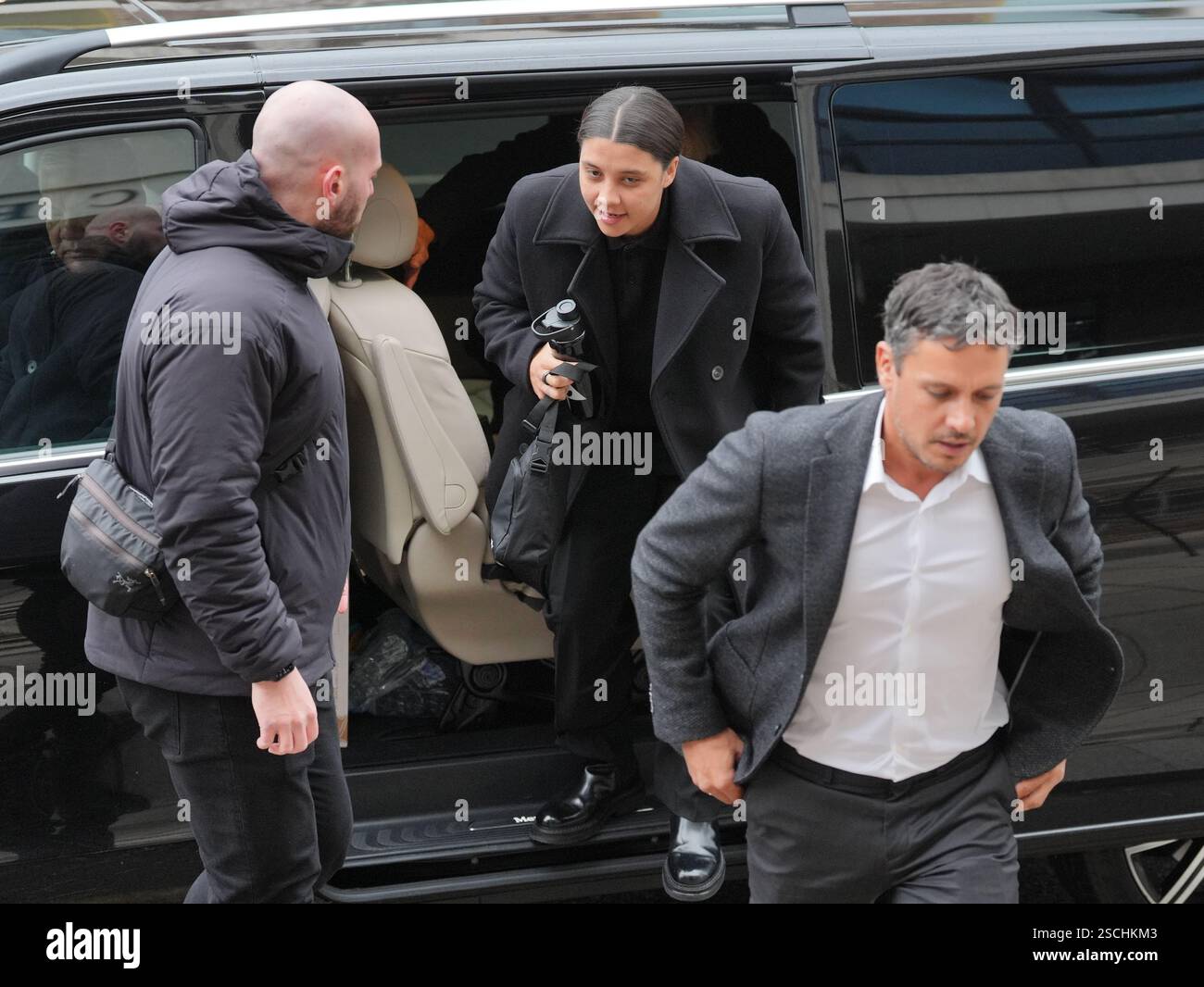 Chelsea and Australia striker Sam Kerr (centre) arrives at Kingston ...