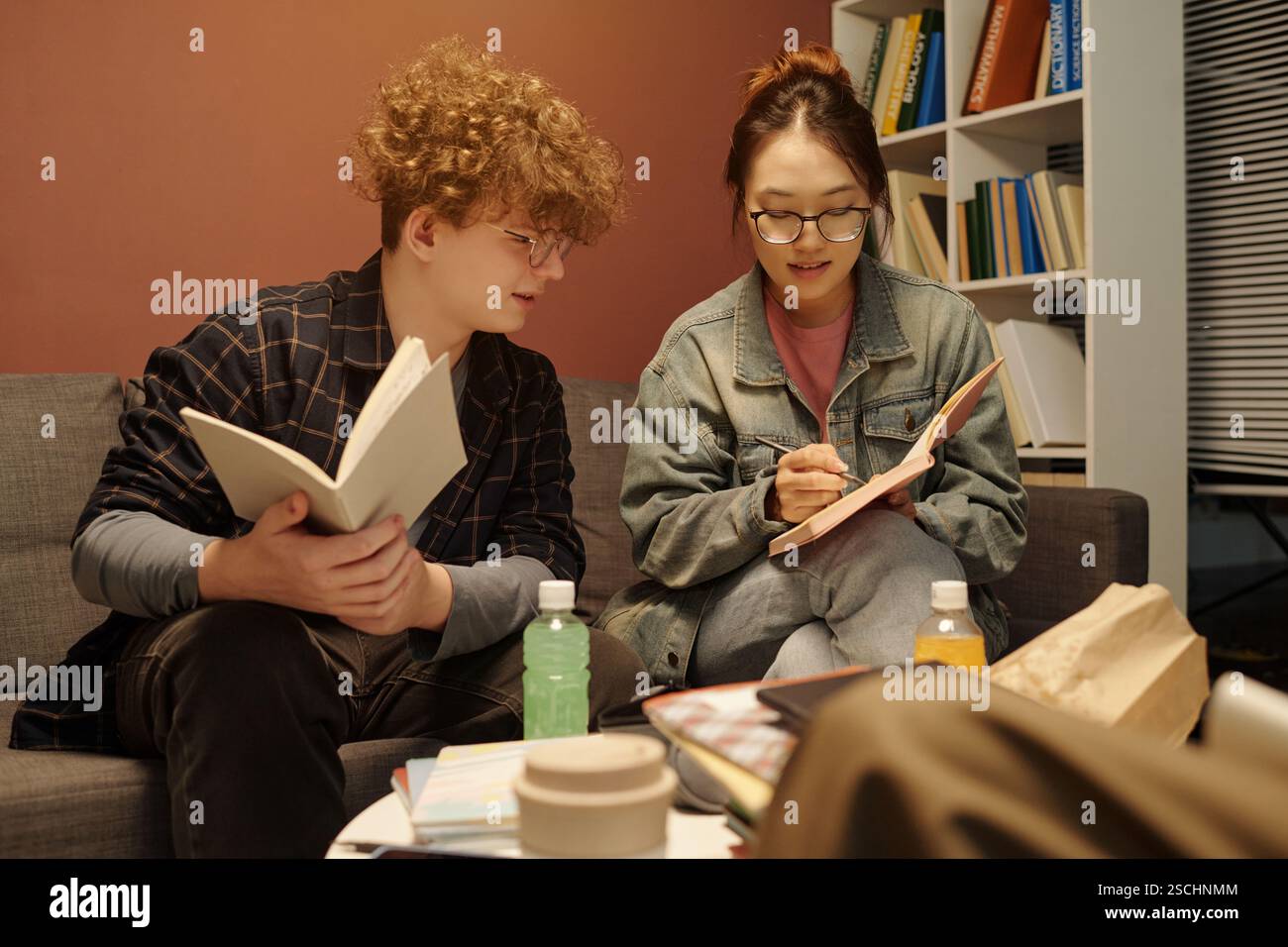 Boy and Girl in Study Session Stock Photo - Alamy