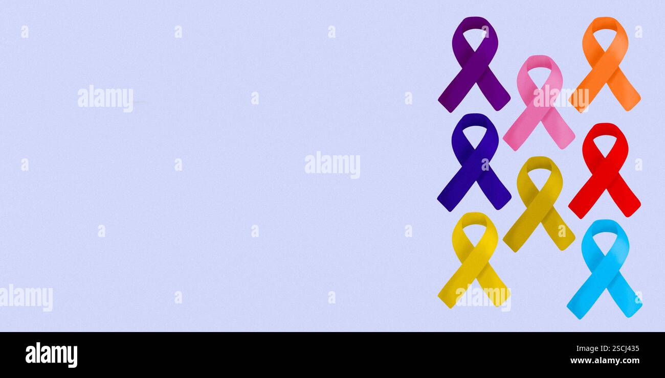 Colorful ribbons against light blue background. World cancer day. World ...